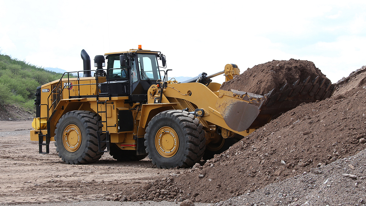 The electric drive Cat 988K XE wheel loader features technology.